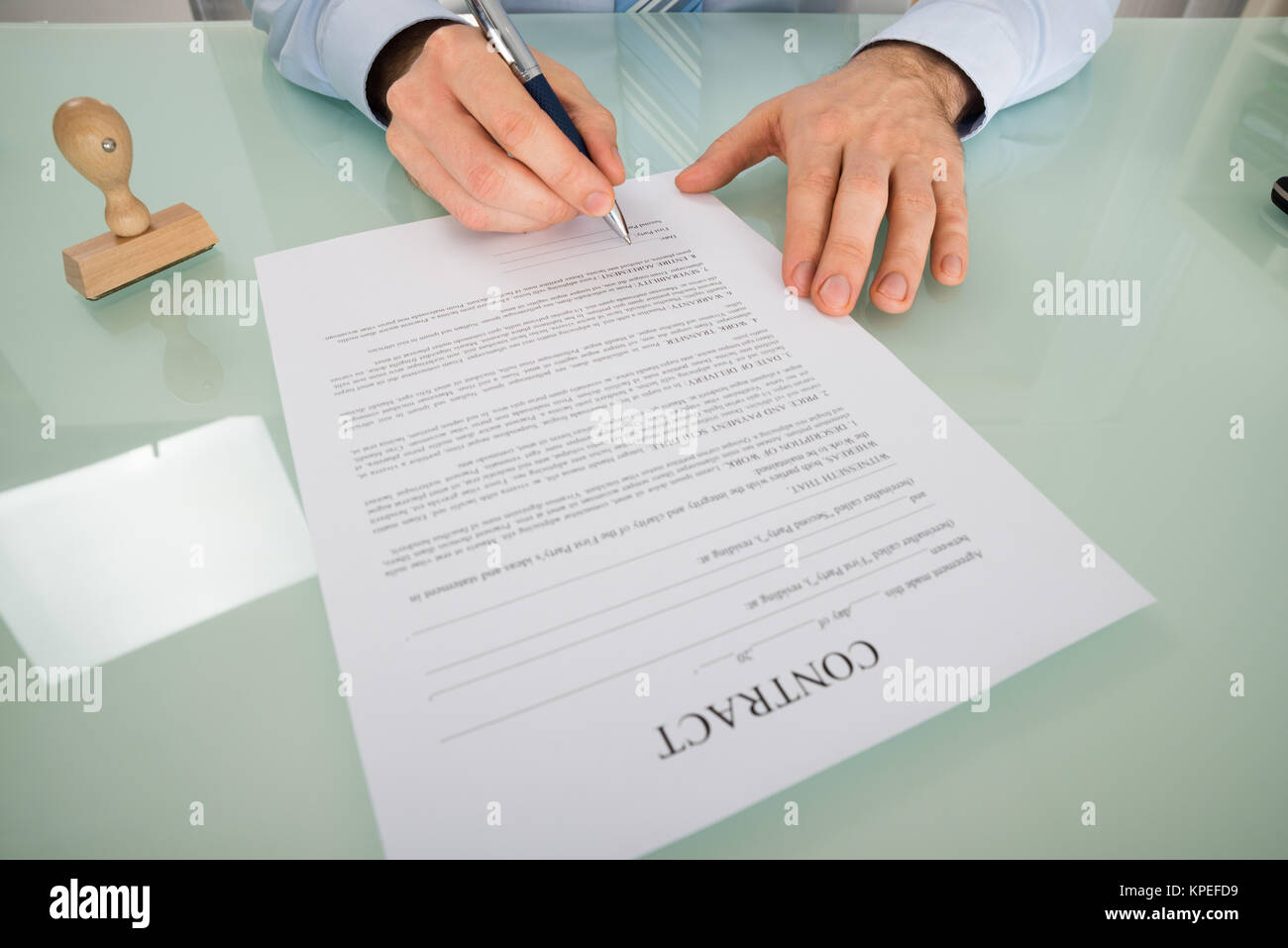 Human hand signing authority document hi-res stock photography and ...