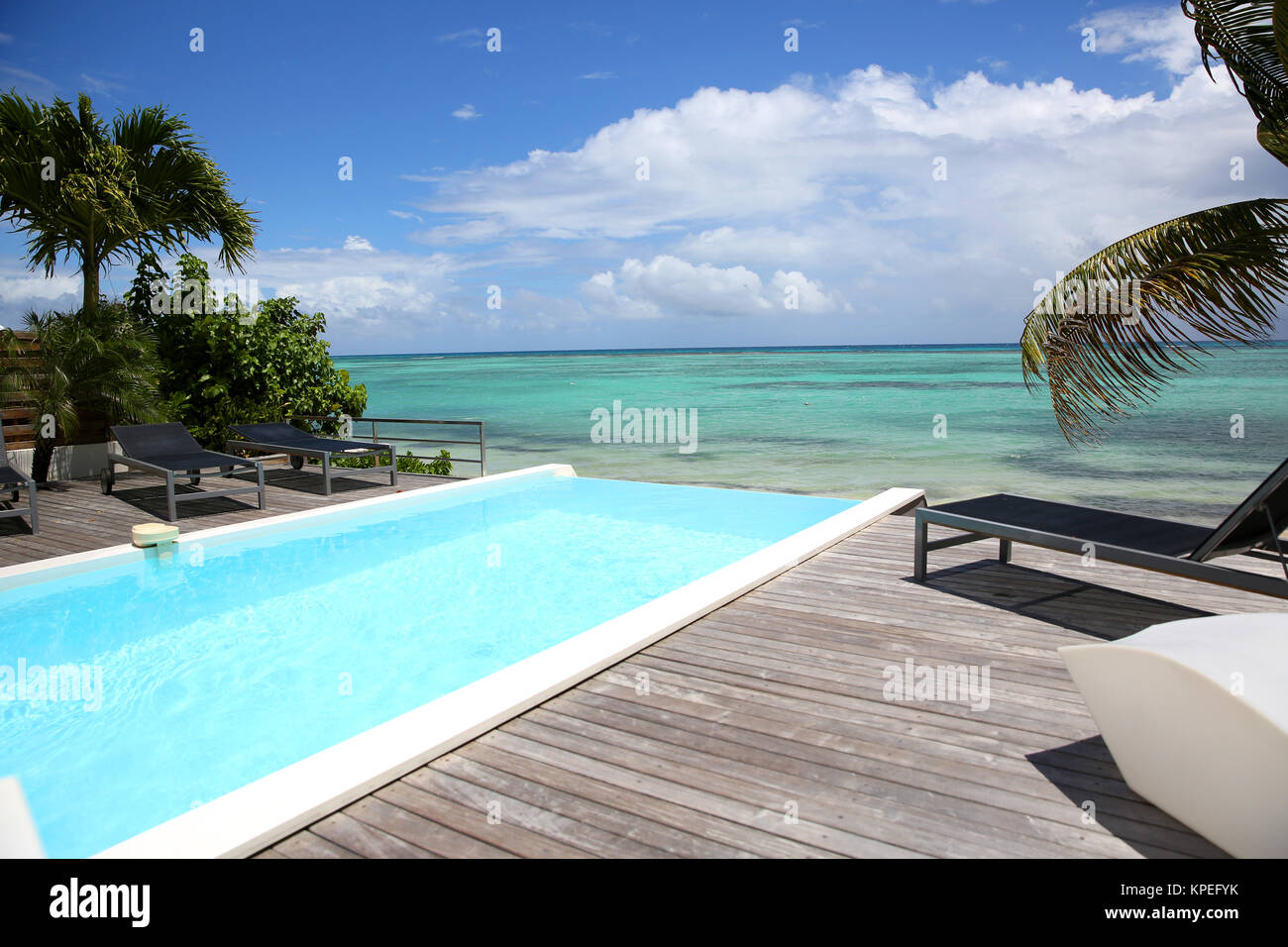 Beautiful swimming-pool next to the sea Stock Photo - Alamy