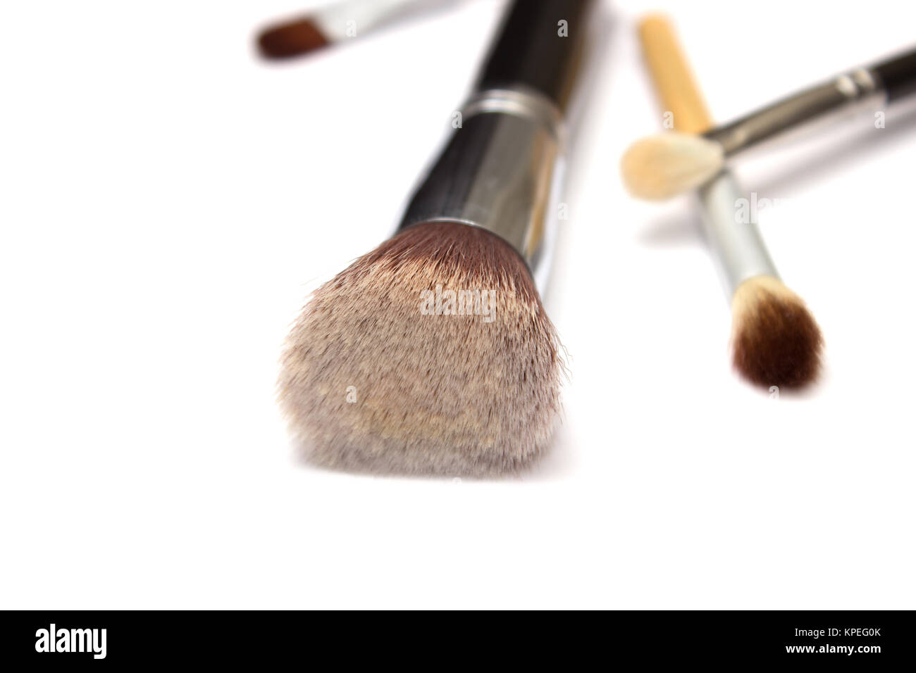 Assorted make up brushes on white background Stock Photo - Alamy