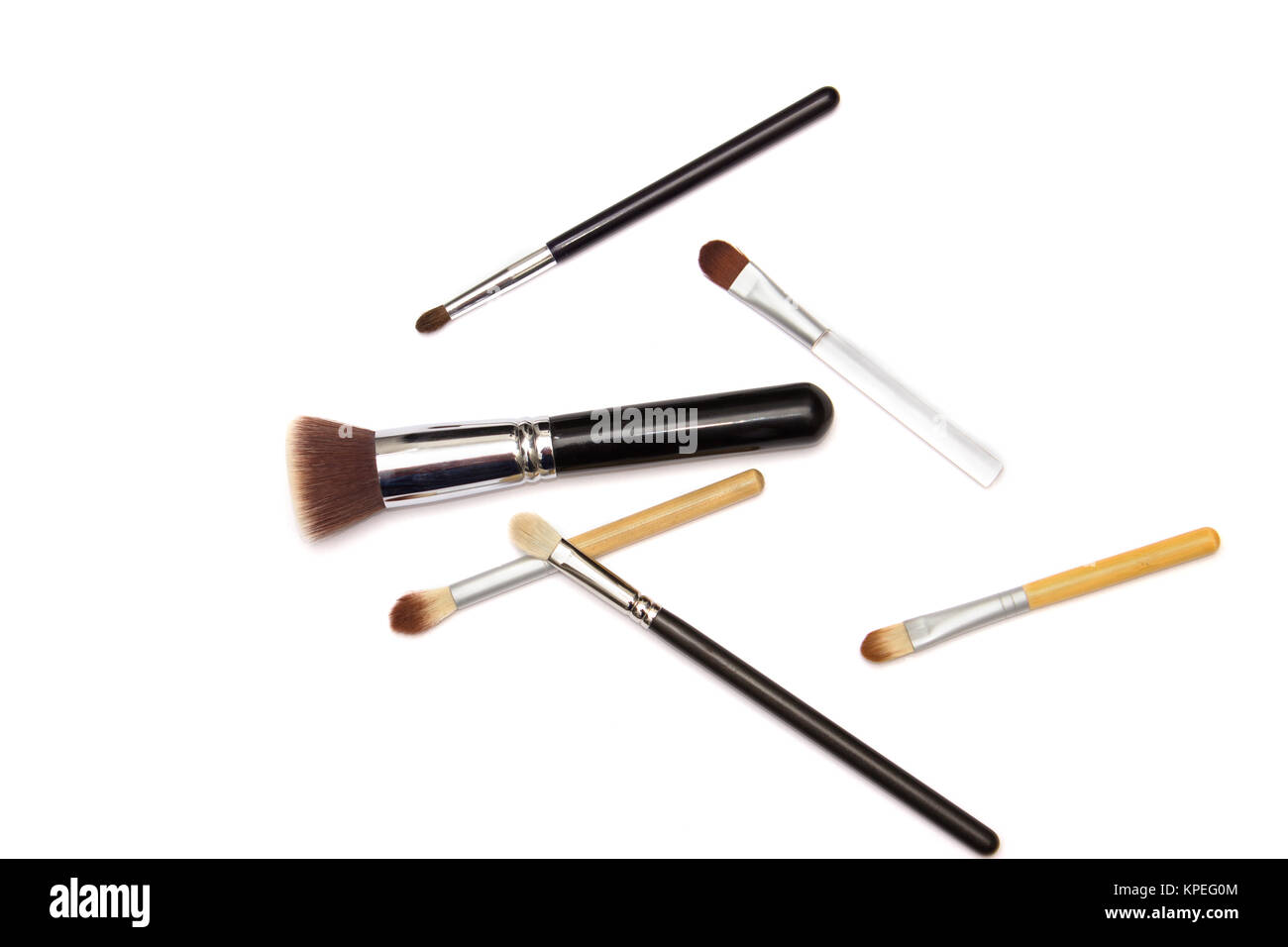 Assorted make up brushes on white background Stock Photo - Alamy