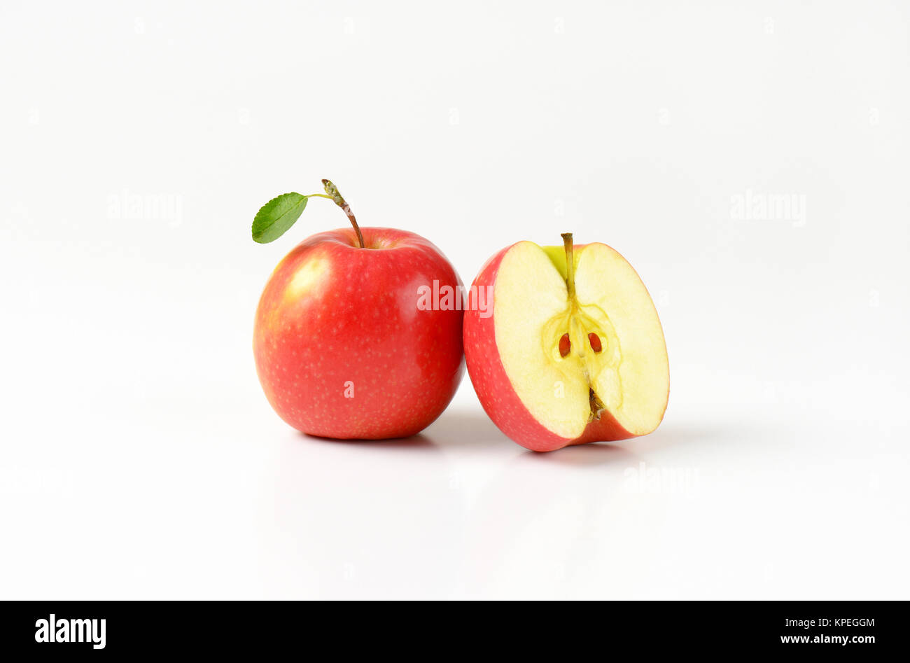 one and a half apples Stock Photo - Alamy