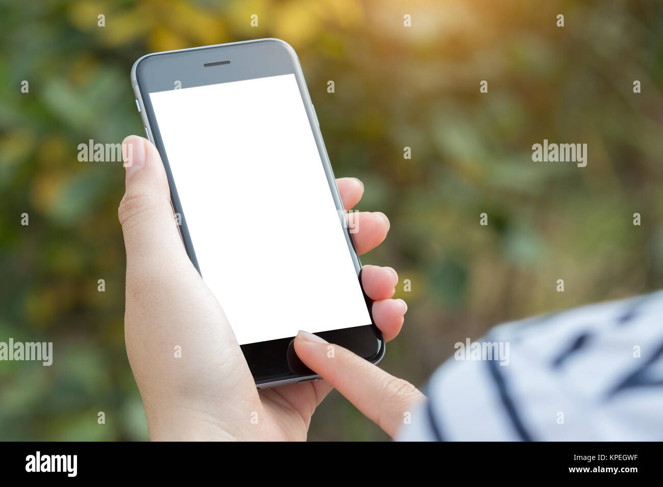 Woman holding iphone 6 hi-res stock photography and images - Alamy