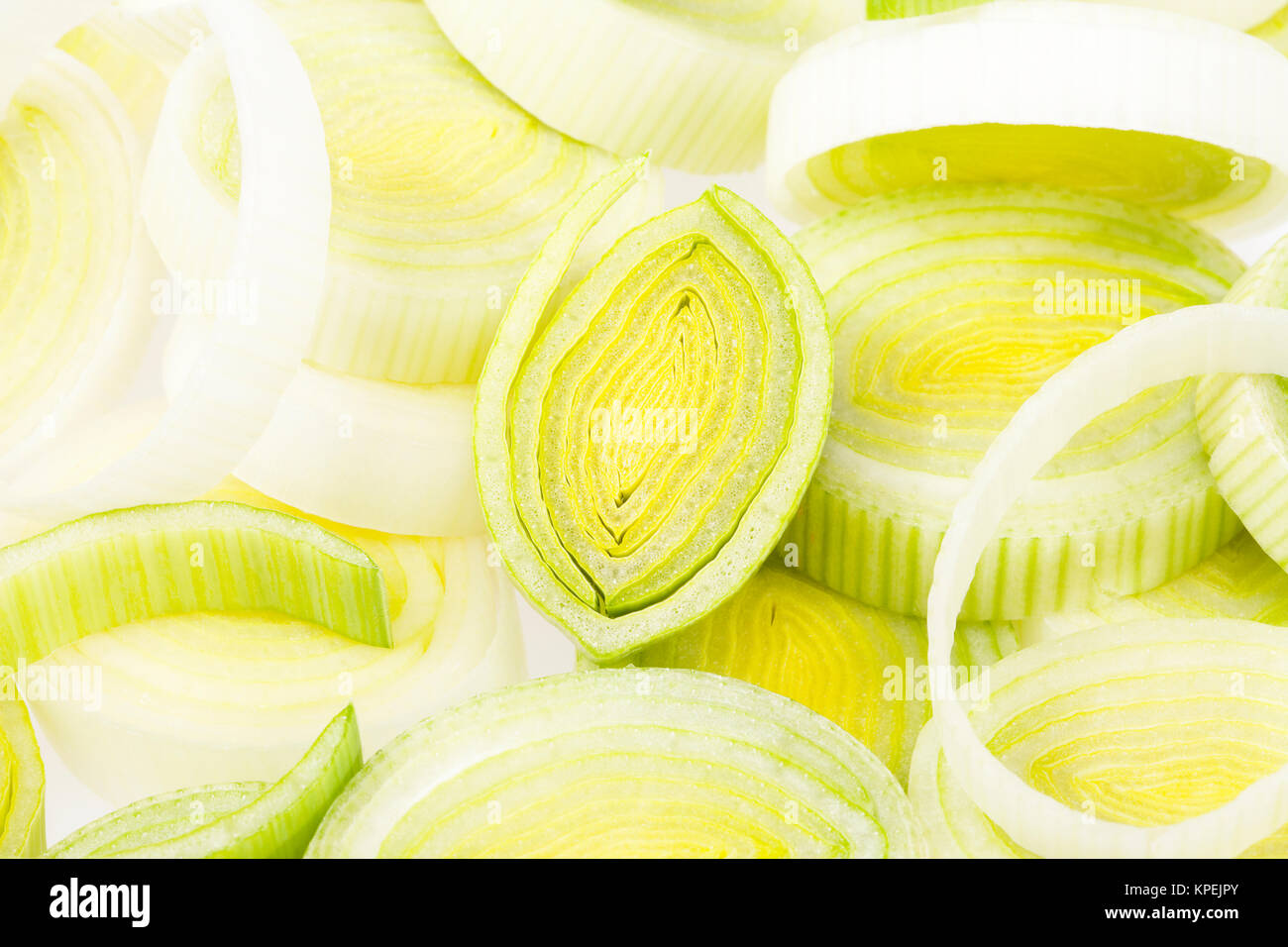 background of sliced leek rings , close up Stock Photo - Alamy