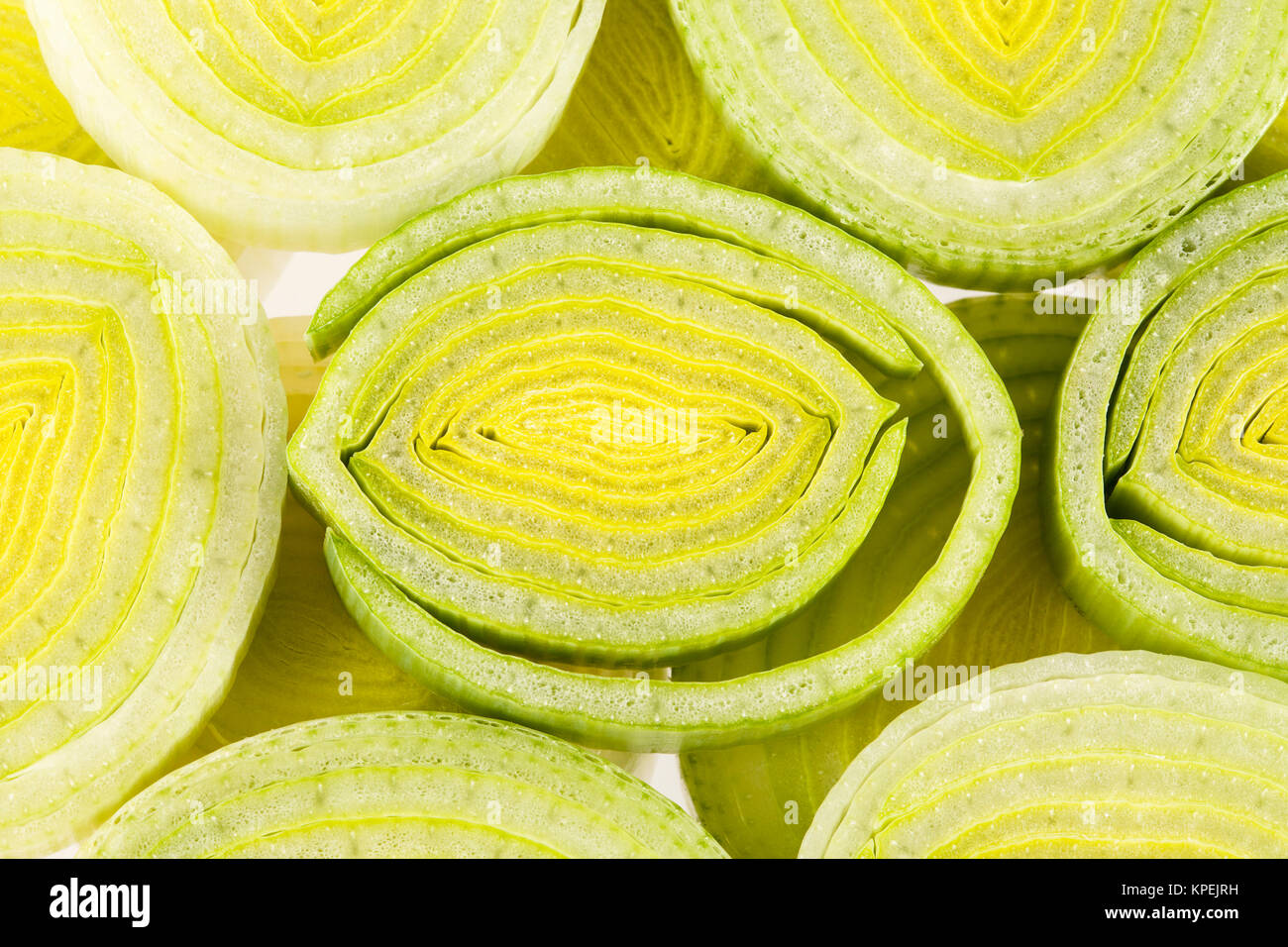 background of sliced leek rings , close up Stock Photo - Alamy