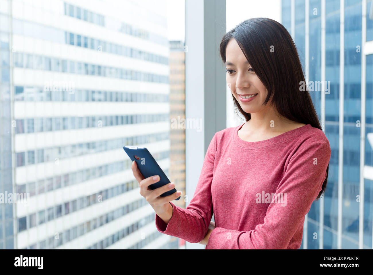Woman with mobile phone Stock Photo - Alamy