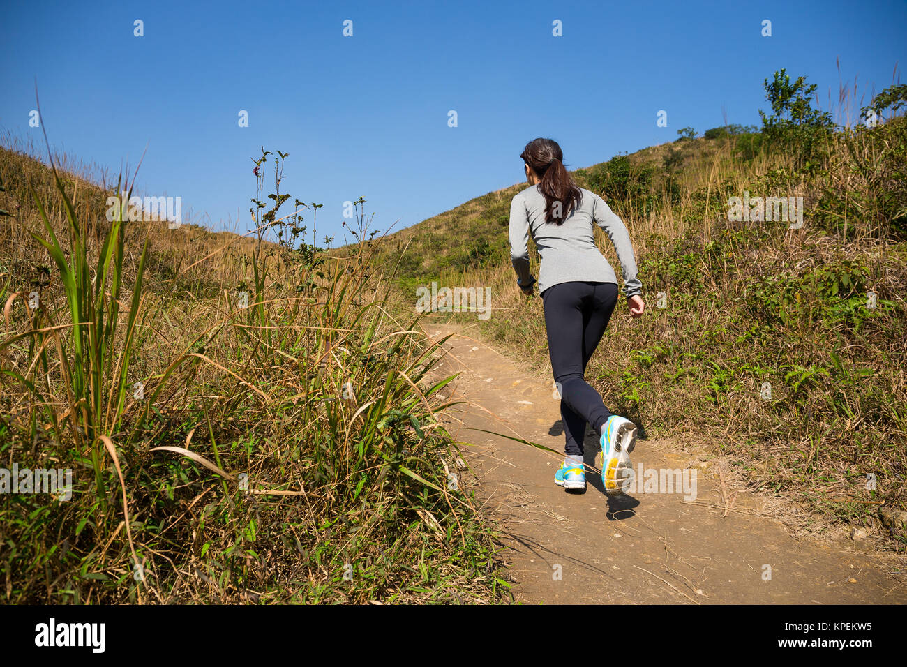 Young woman go running Stock Photo - Alamy