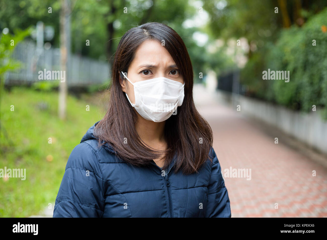 Asian woman wear face mask in city Stock Photo - Alamy