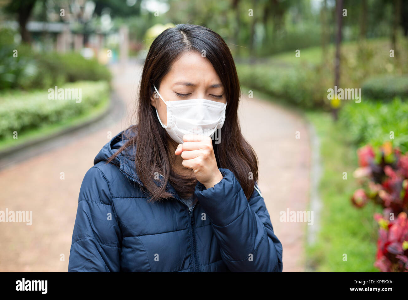 Woman wear facemask outdoor hi-res stock photography and images - Alamy