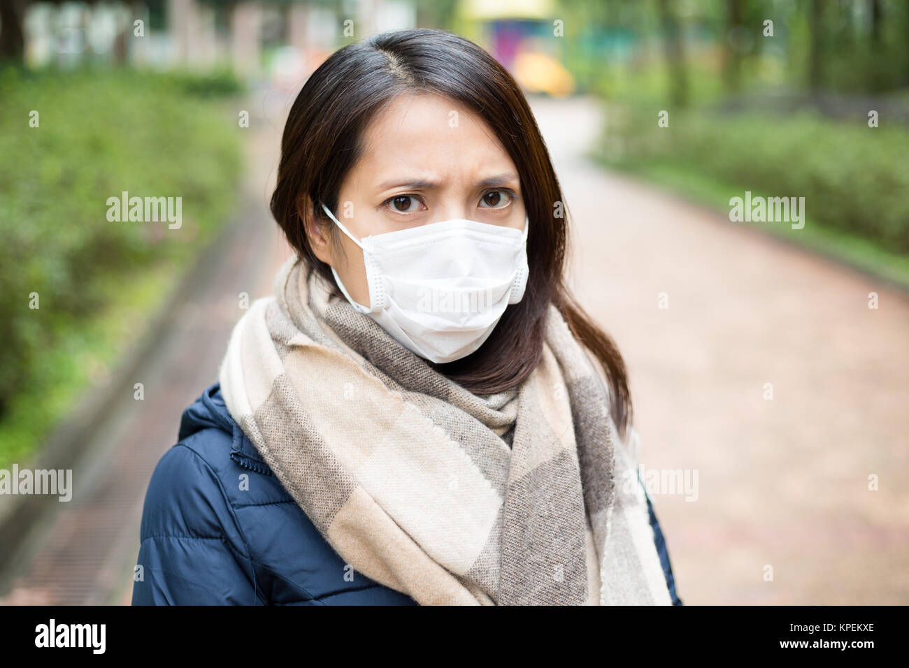 Woman wear facemask outdoor Stock Photo - Alamy