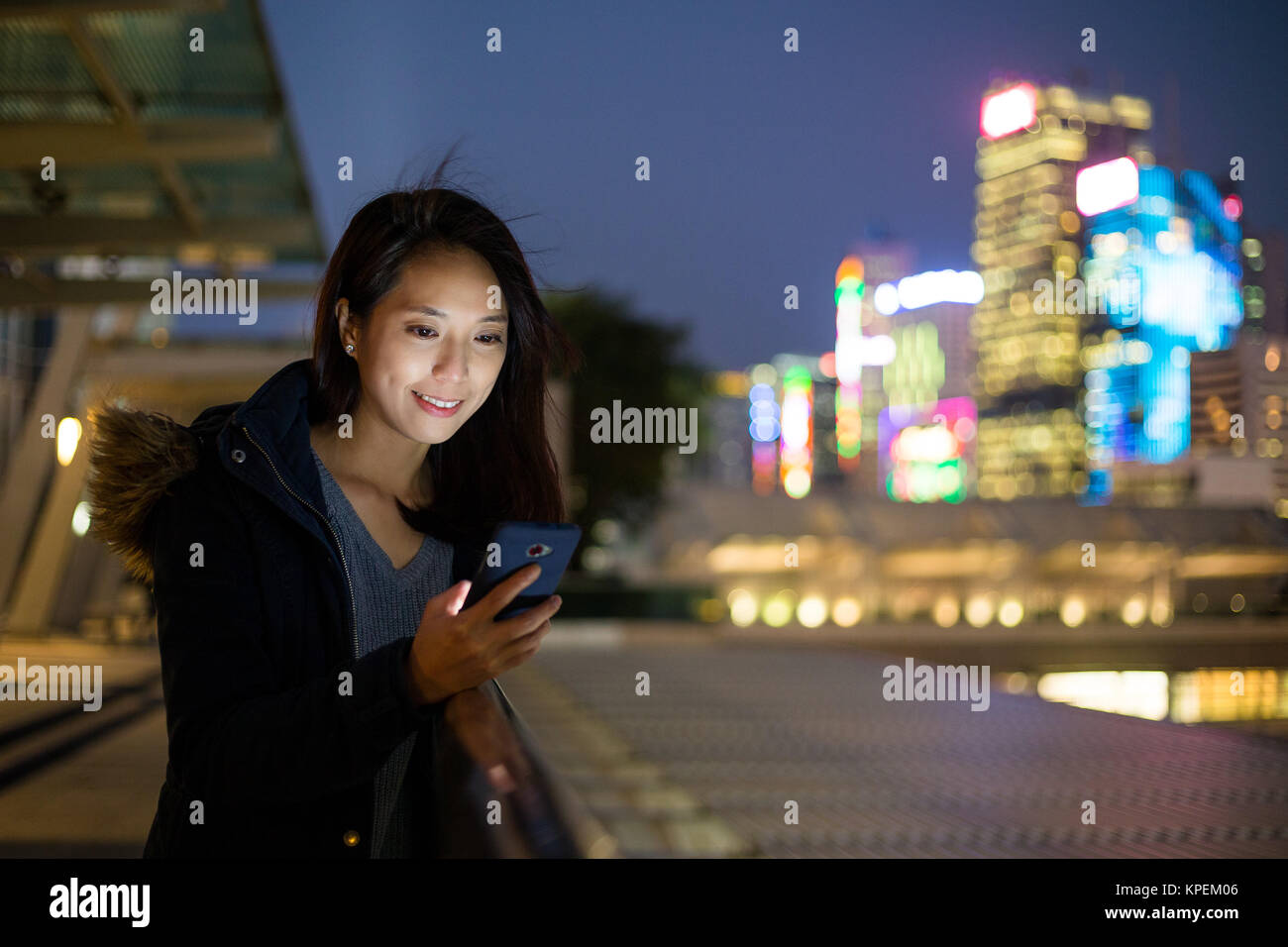 Woman use phone at outdoor Stock Photo - Alamy