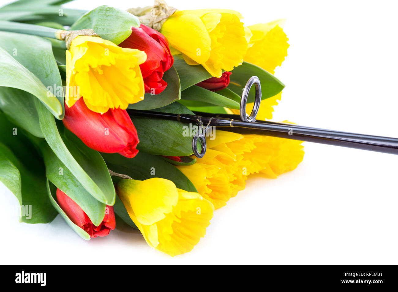 fishing rod with bouquet spring flowers Stock Photo - Alamy