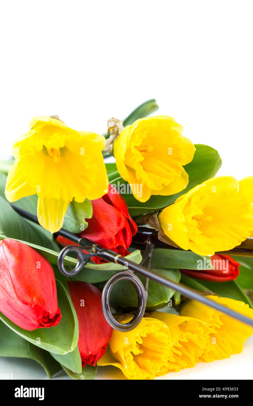 fishing rod with bouquet spring flowers Stock Photo - Alamy