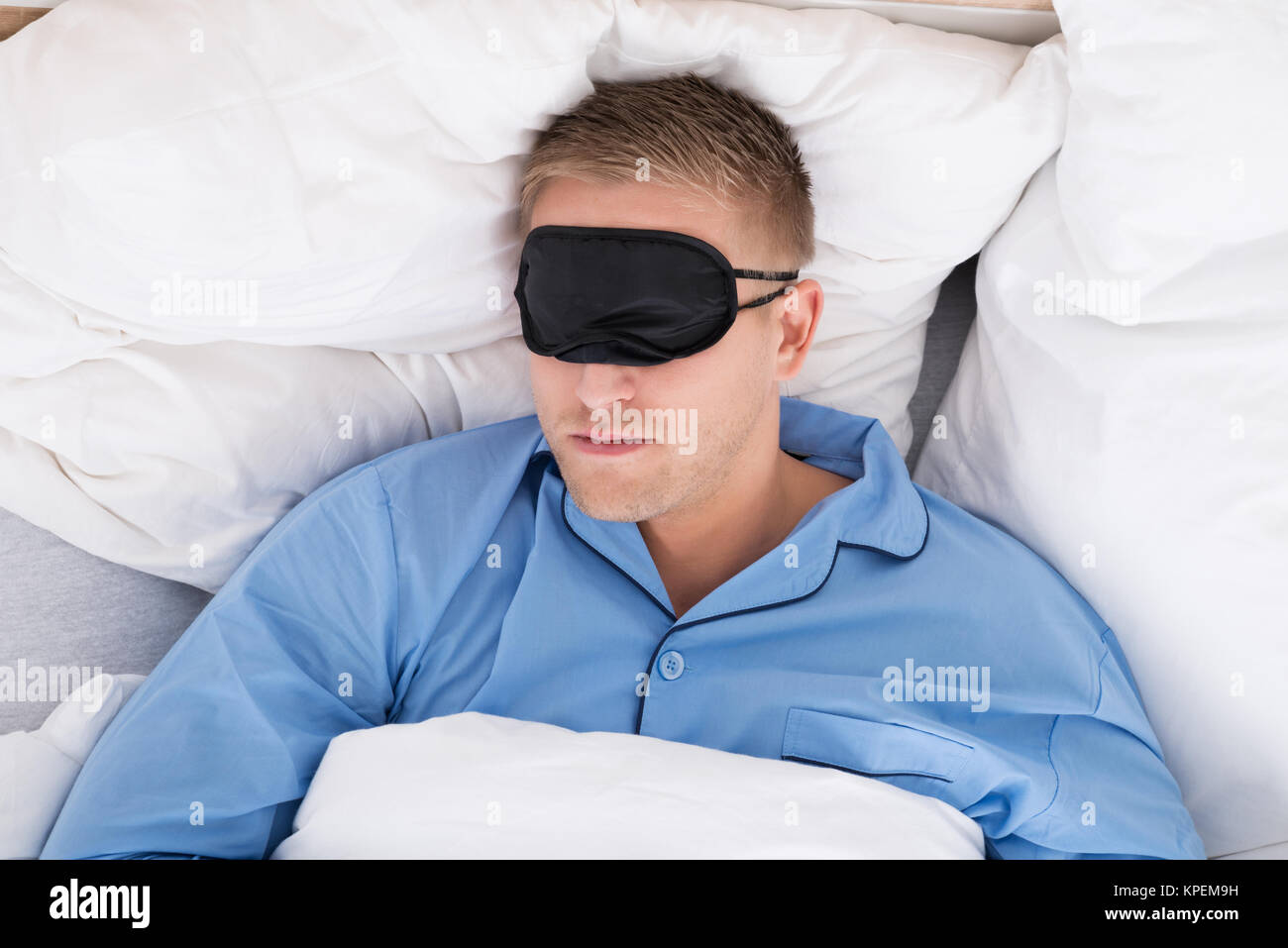 Man wearing blindfold hi-res stock photography and images - Alamy