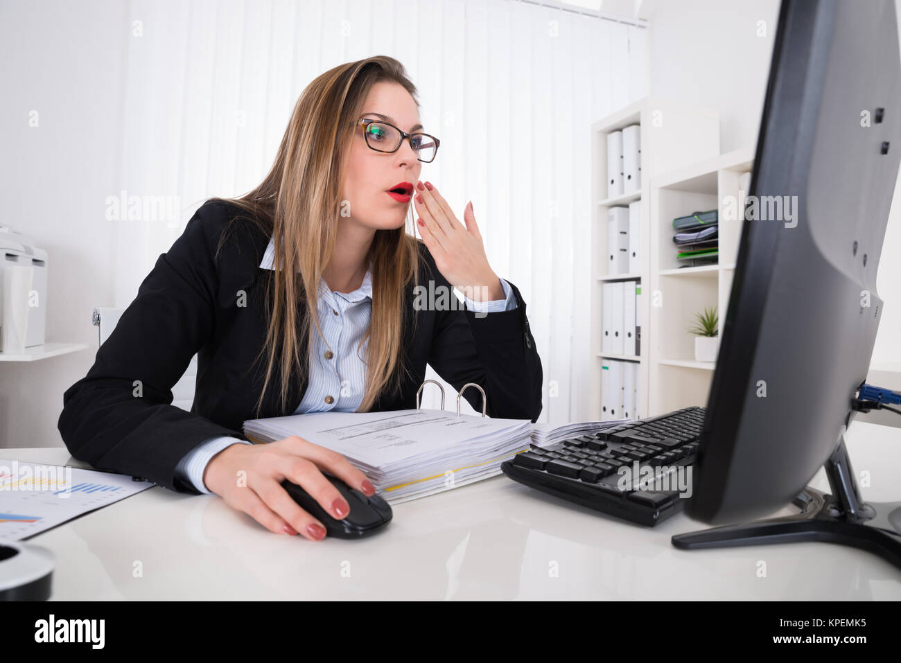 Shocked Businesswoman Looking At Computer Stock Photo - Alamy