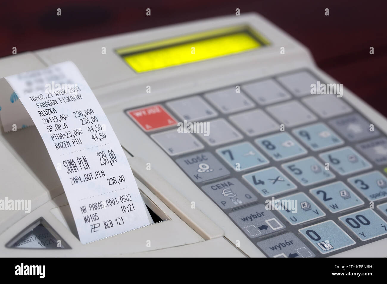 Cash register with cash register receipt Stock Photo - Alamy