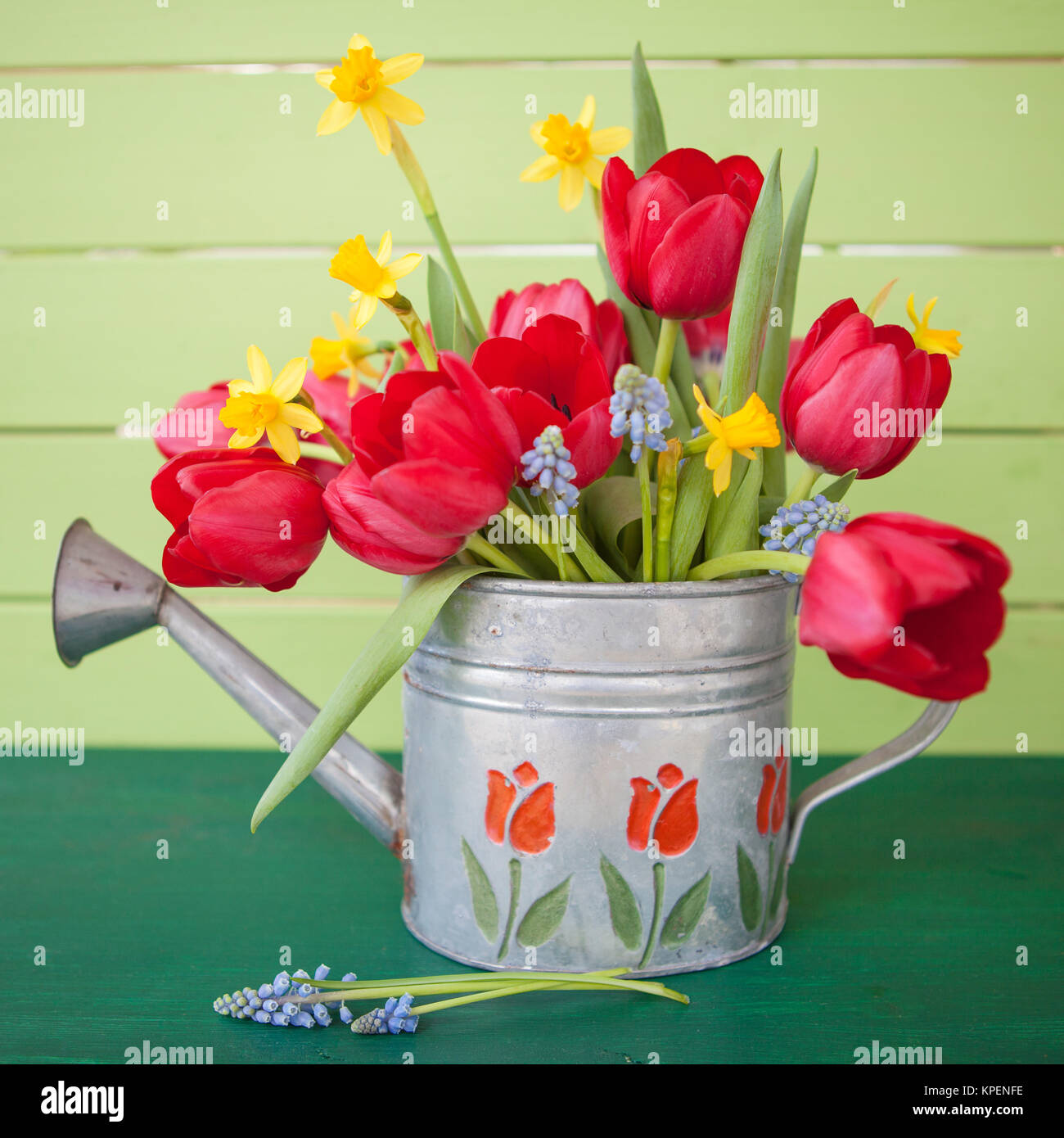 spring flowers in vintage jug Stock Photo - Alamy