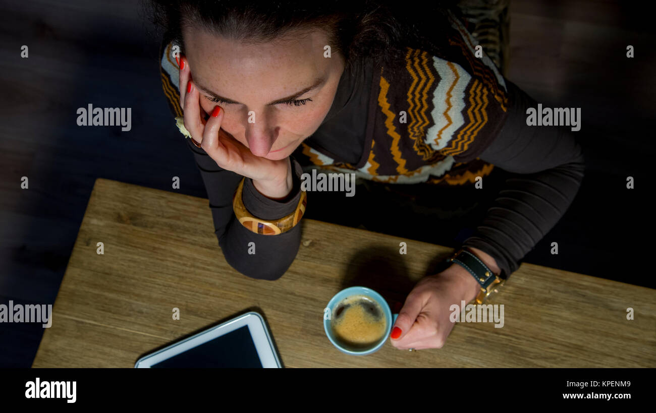 woman with coffee and tablet Stock Photo - Alamy
