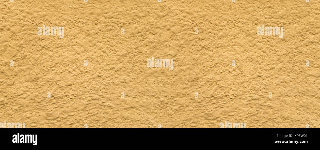 Panorama of a yellow house wall with coarse plaster Stock Photo - Alamy