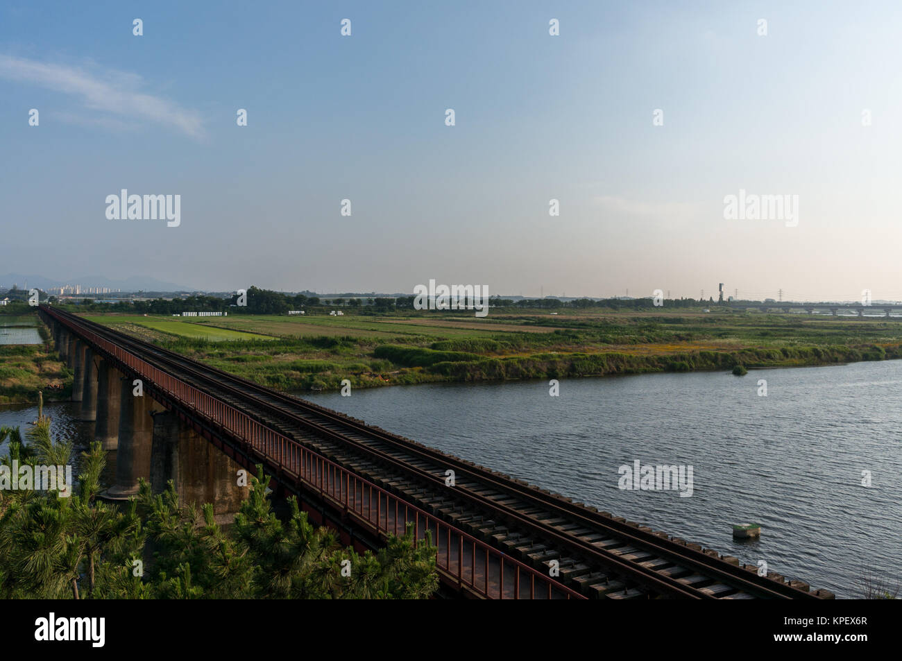 Railway over farm land Stock Photo - Alamy
