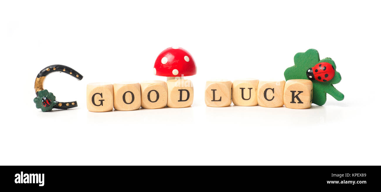 Wooden dices with the words Good luck on a white background Stock Photo ...