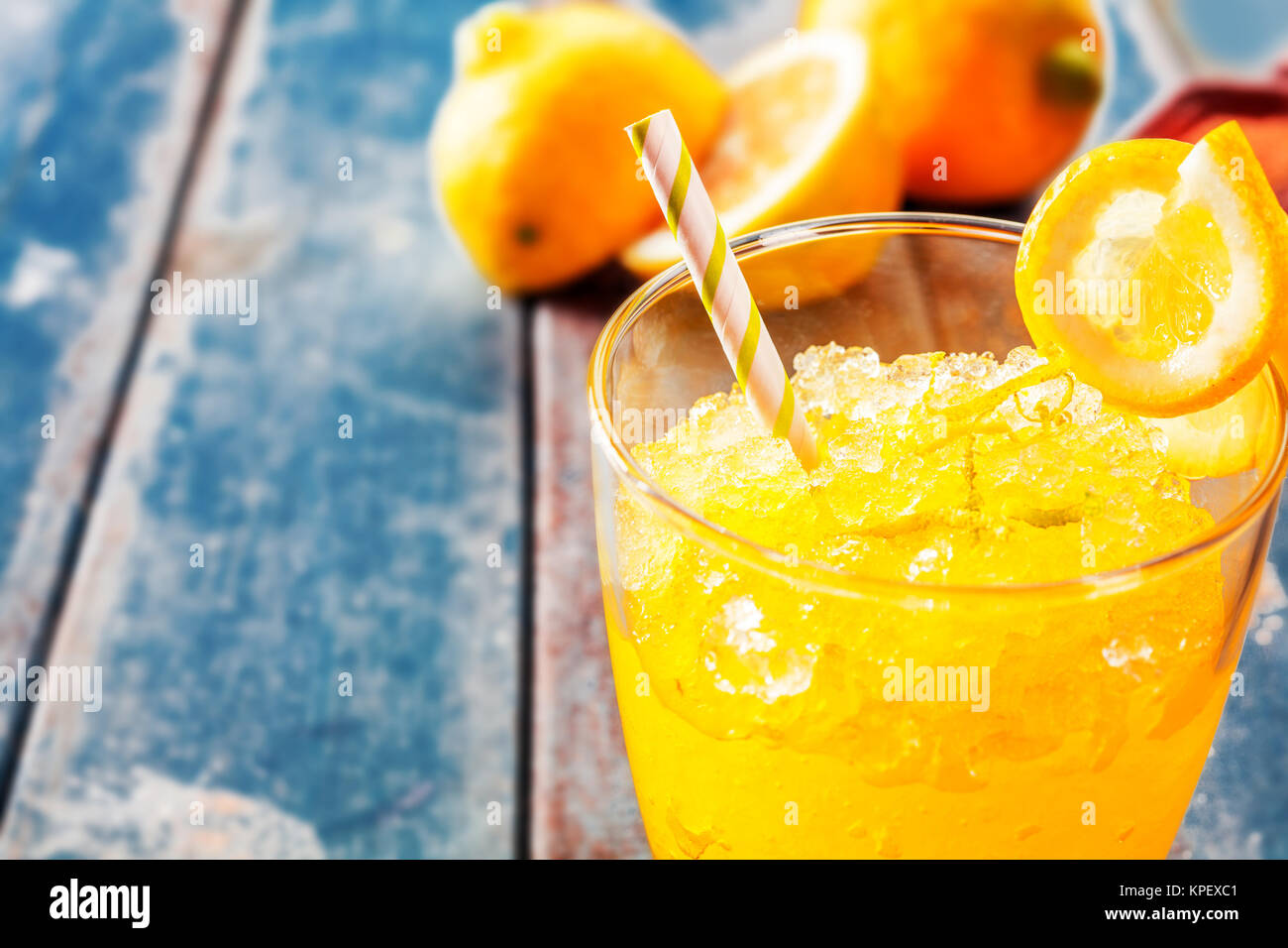 Close Up of Fresh Orange Frozen Granita Slush Drink Garnished with ...