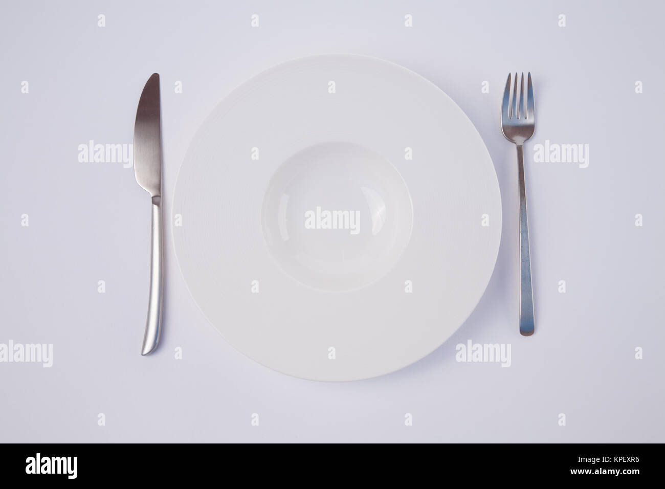 empty white dish and cutlery Stock Photo - Alamy