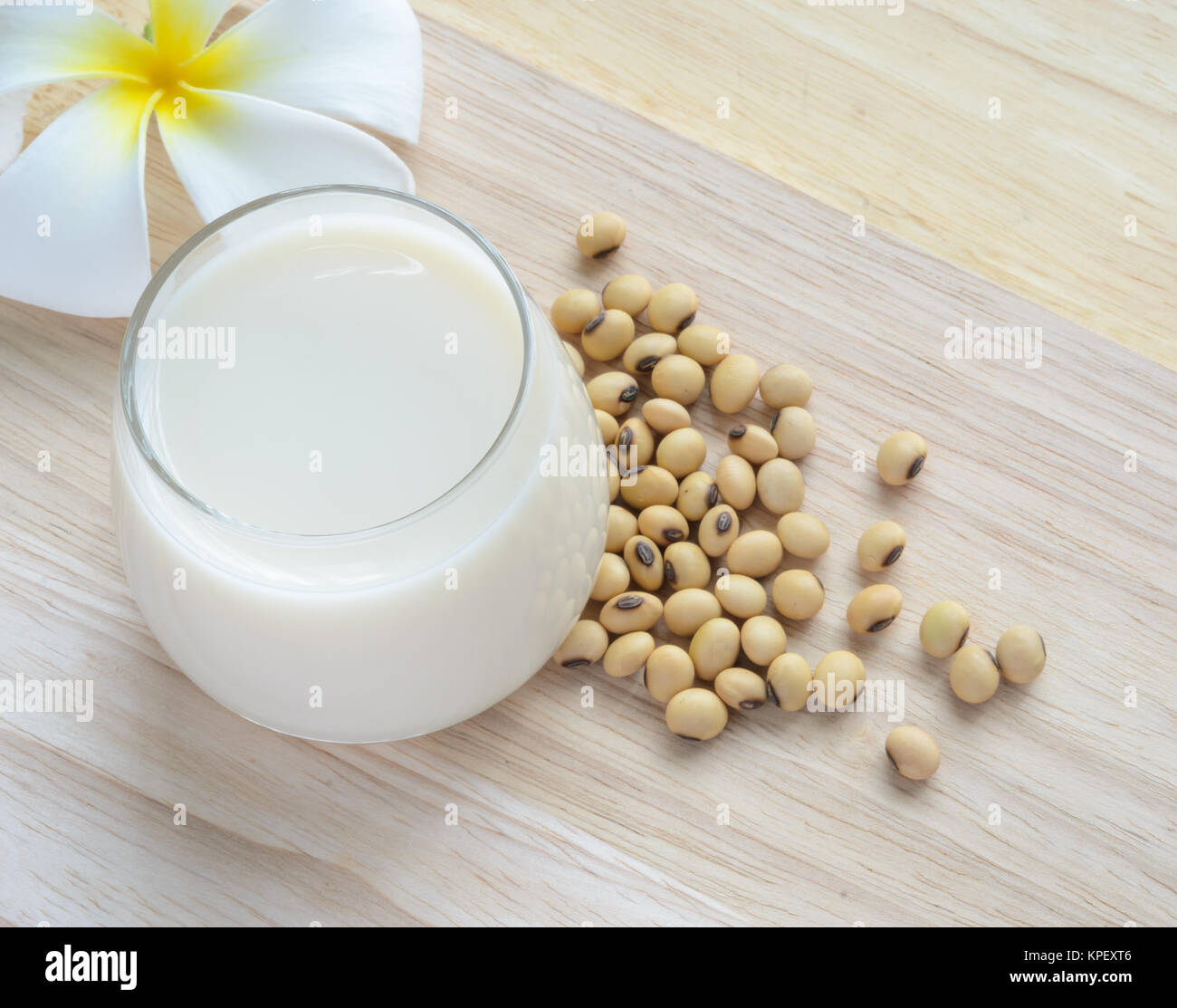 Fresh Soy milk (Soya milk) in a glass and soybean seeds Stock Photo - Alamy