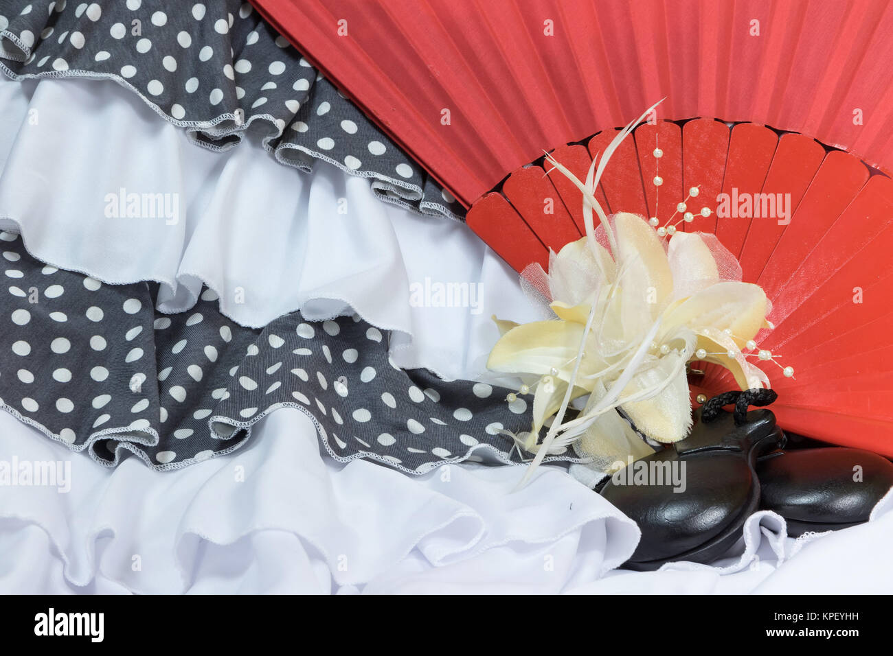 Clothing for Flamenco with red fan Stock Photo - Alamy