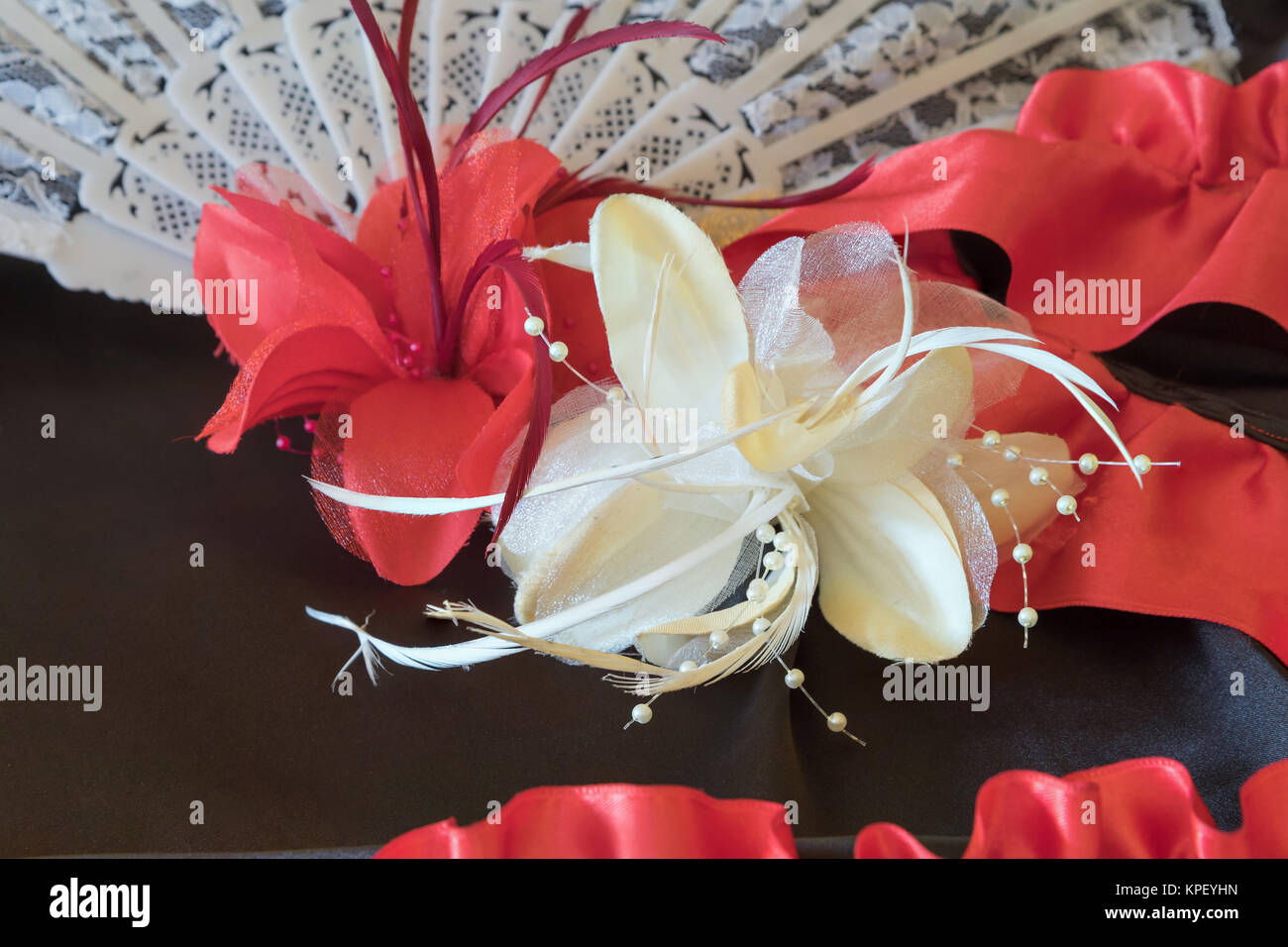 The red and yellow cloth Flamenco roses closeup Stock Photo - Alamy