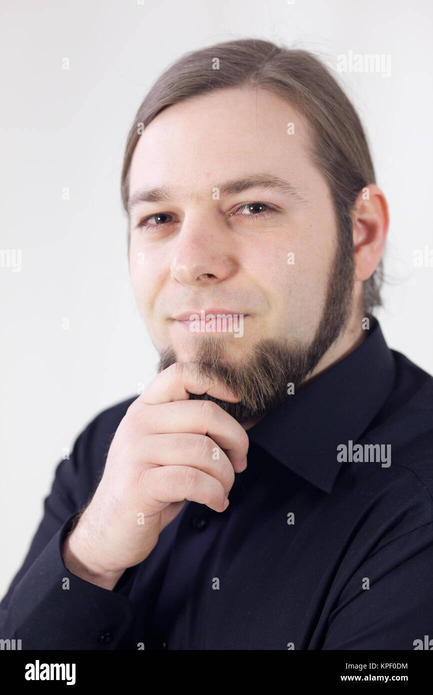 portrait of a young man with beard Stock Photo - Alamy