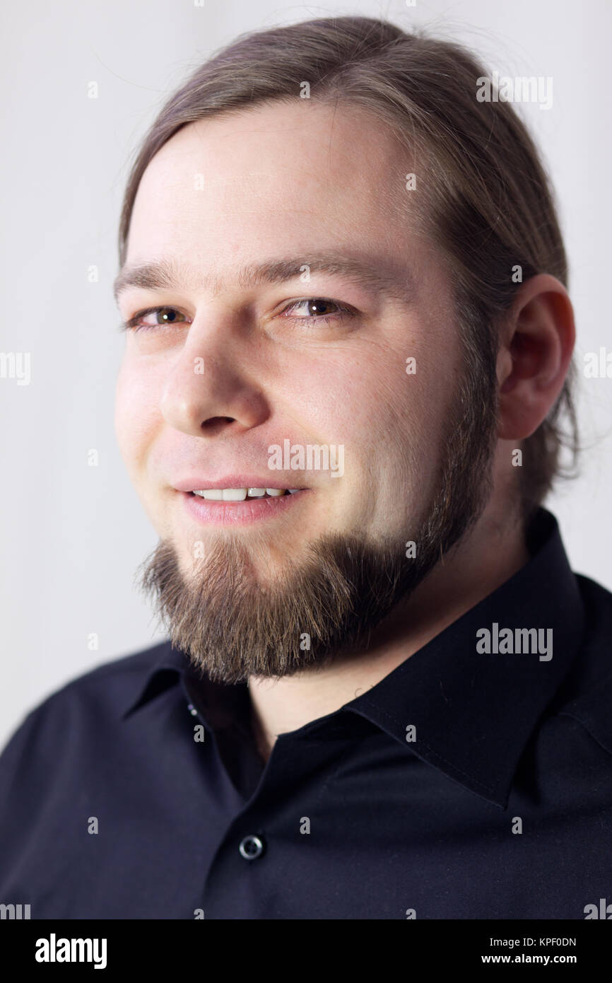 portrait of a young man with beard Stock Photo - Alamy