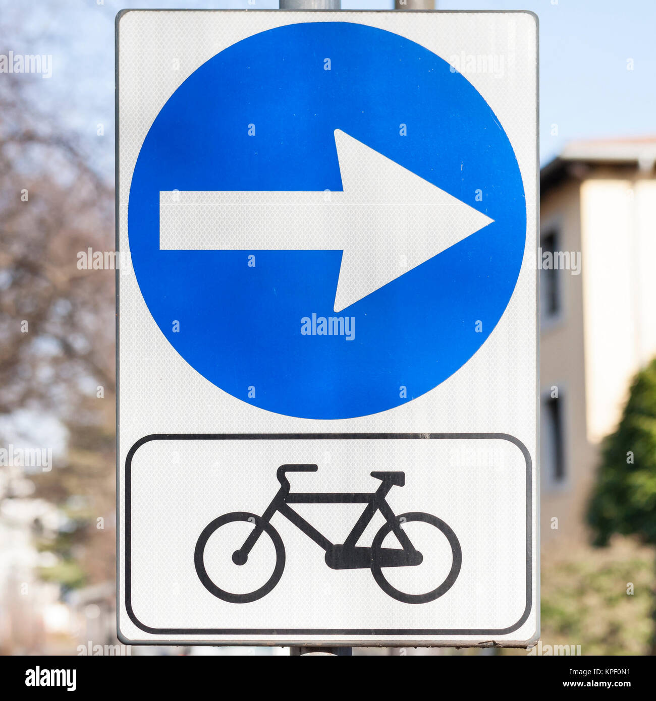 Road sign indicating the direction of the bike path Stock Photo - Alamy