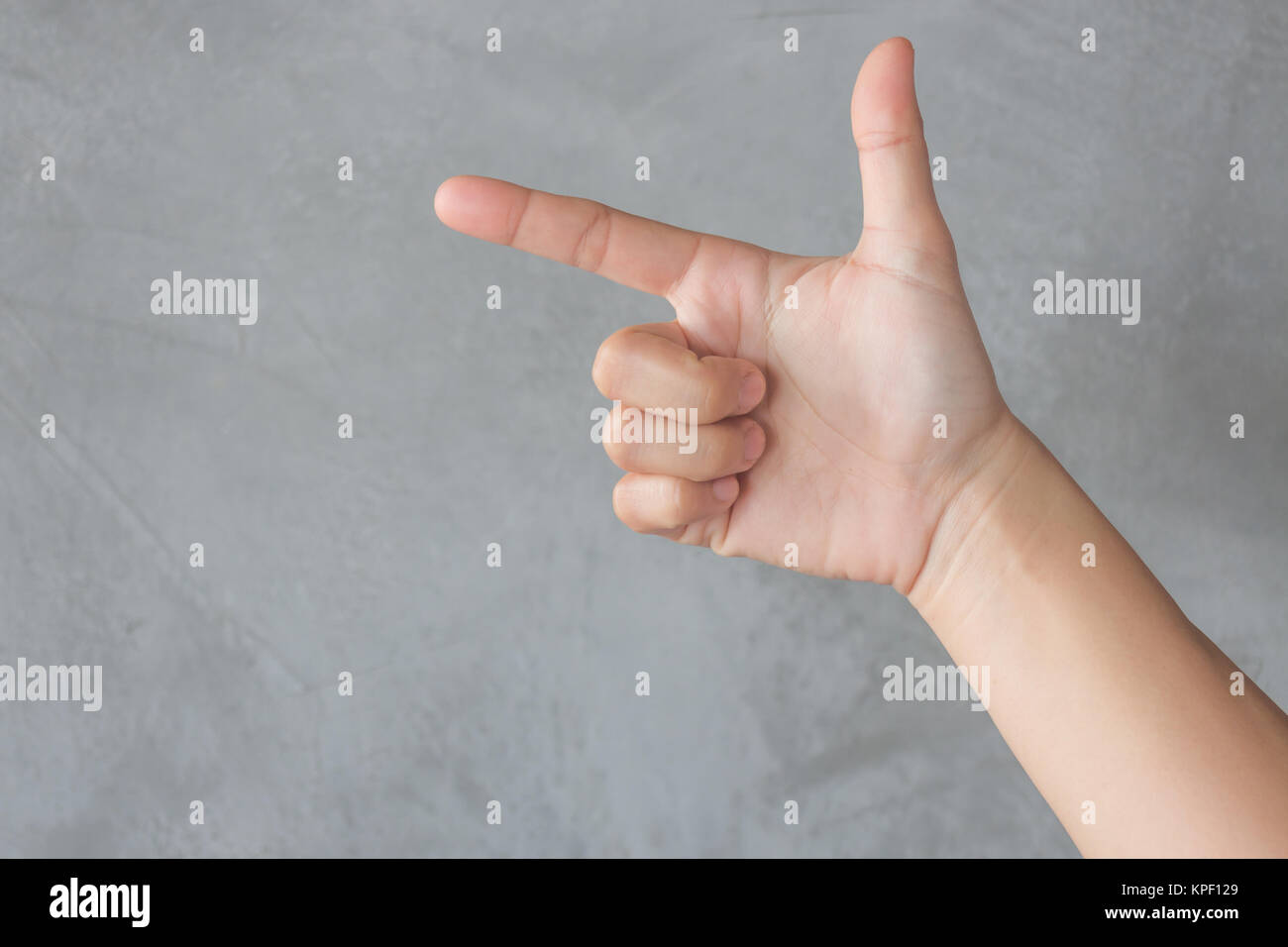 Hand action gesture on grey background Stock Photo - Alamy