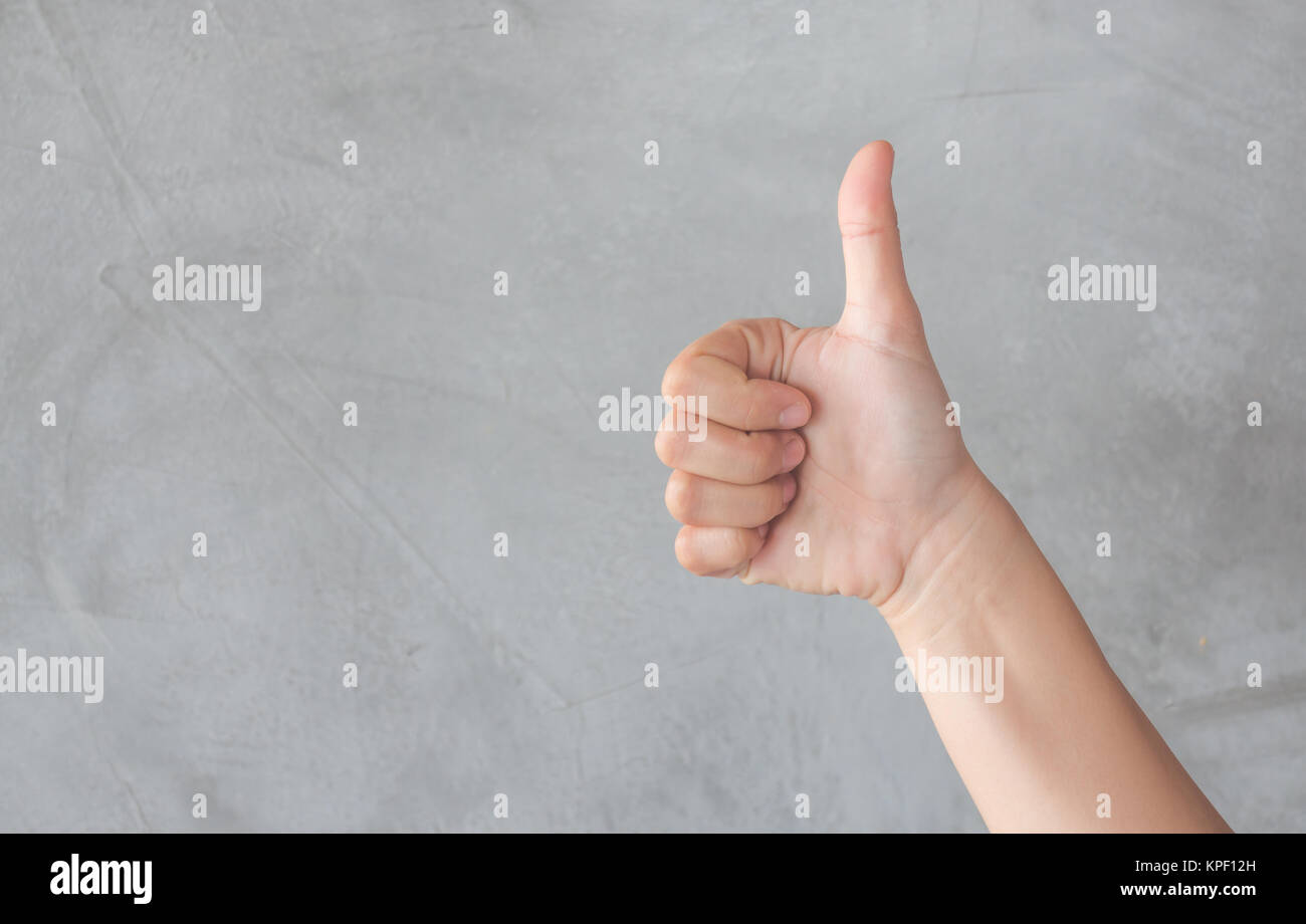 Hand action gesture on grey background Stock Photo - Alamy