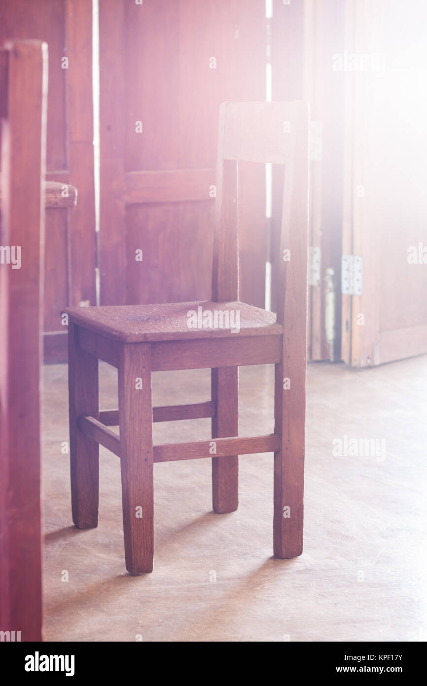 Old style wooden chair in coffee shop with vintage filter Stock Photo ...