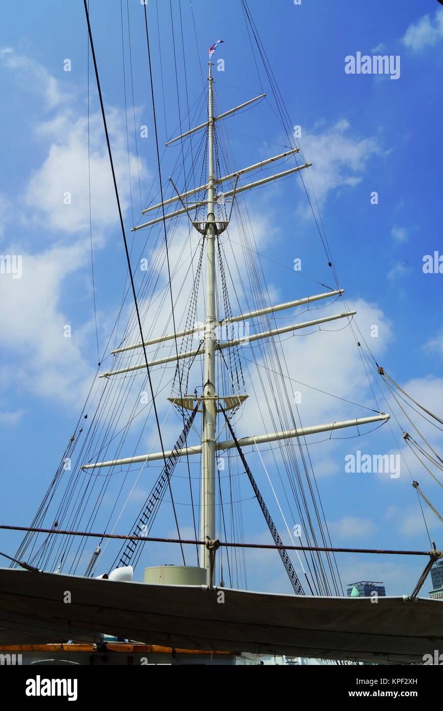 Large mast of a sailing ship under blue sky Stock Photo - Alamy