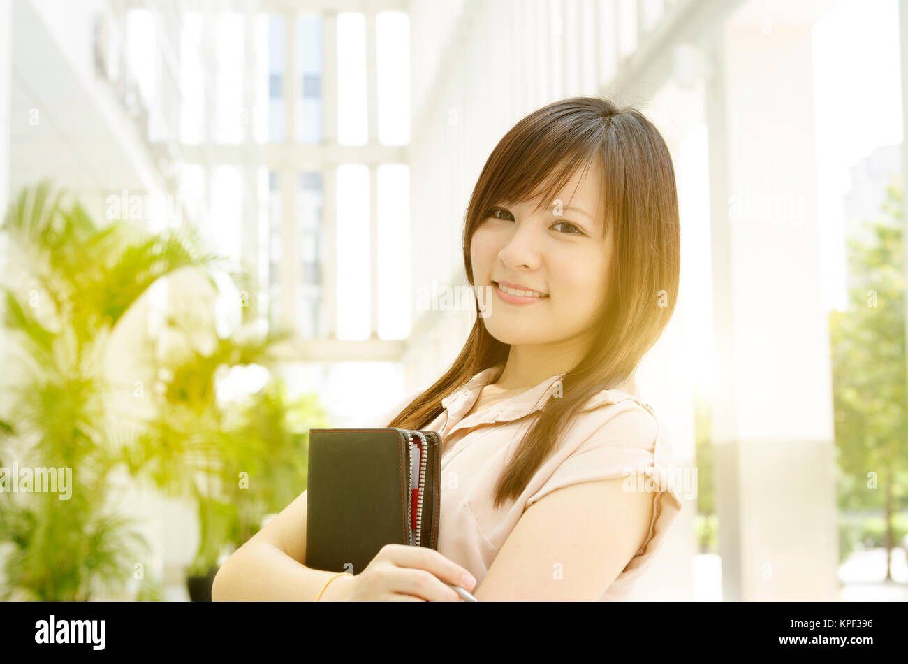 Young Asian female executive portrait Stock Photo - Alamy