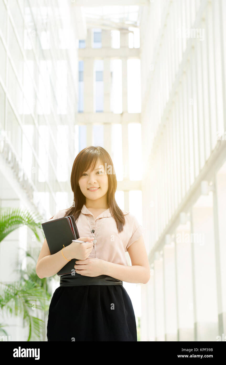 Young Asian woman executive smiling Stock Photo - Alamy