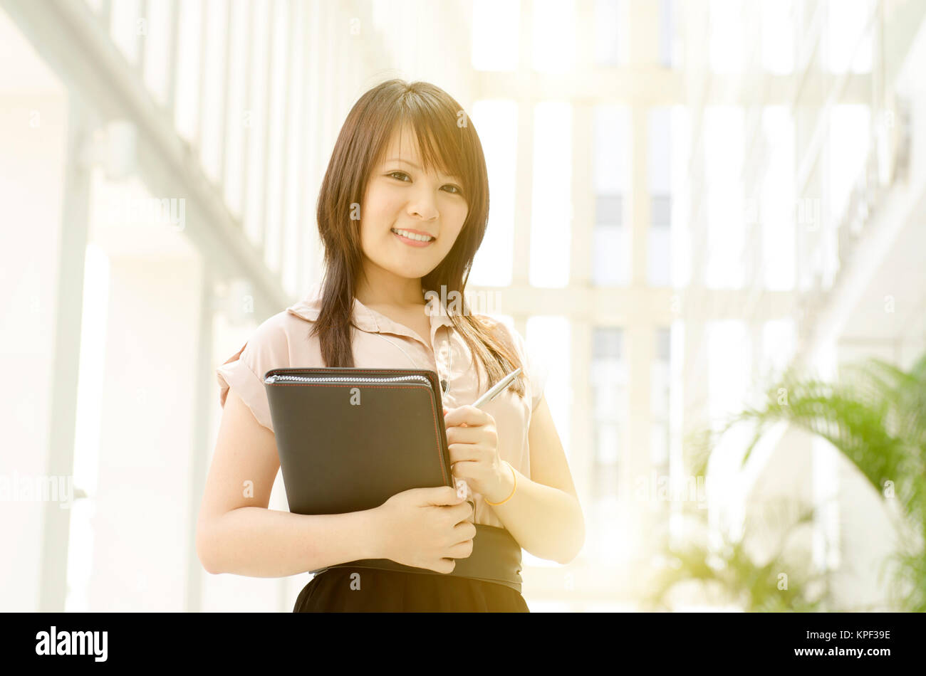 Young Asian female executive Stock Photo - Alamy