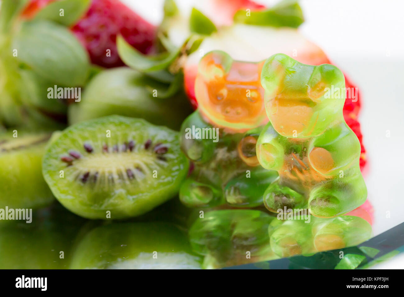 Rubber bears in fruit Stock Photo - Alamy