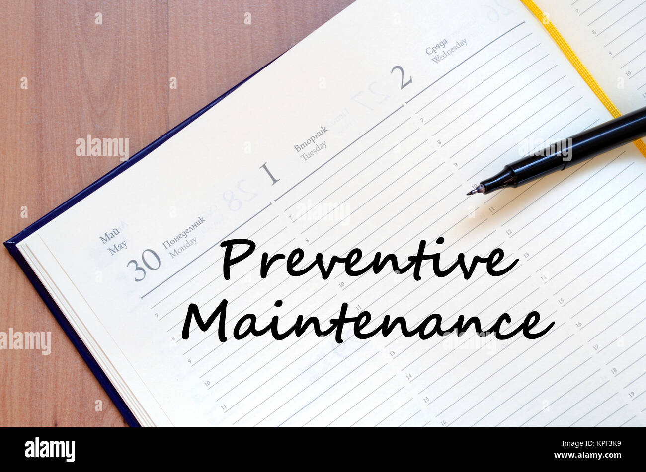 Preventive maintenance write on notebook Stock Photo - Alamy