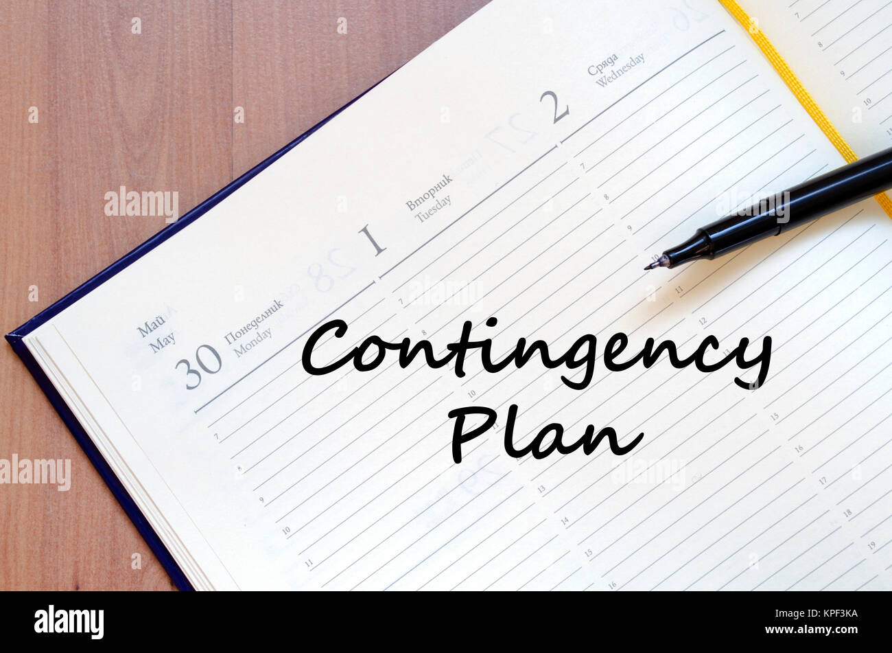 Contingency plan write on notebook Stock Photo - Alamy
