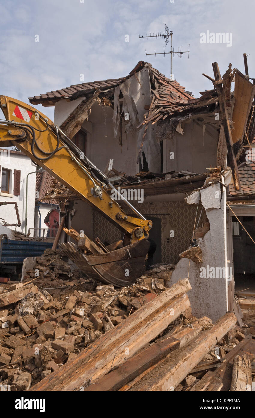 Bulldozer tearing down building hi-res stock photography and images - Alamy