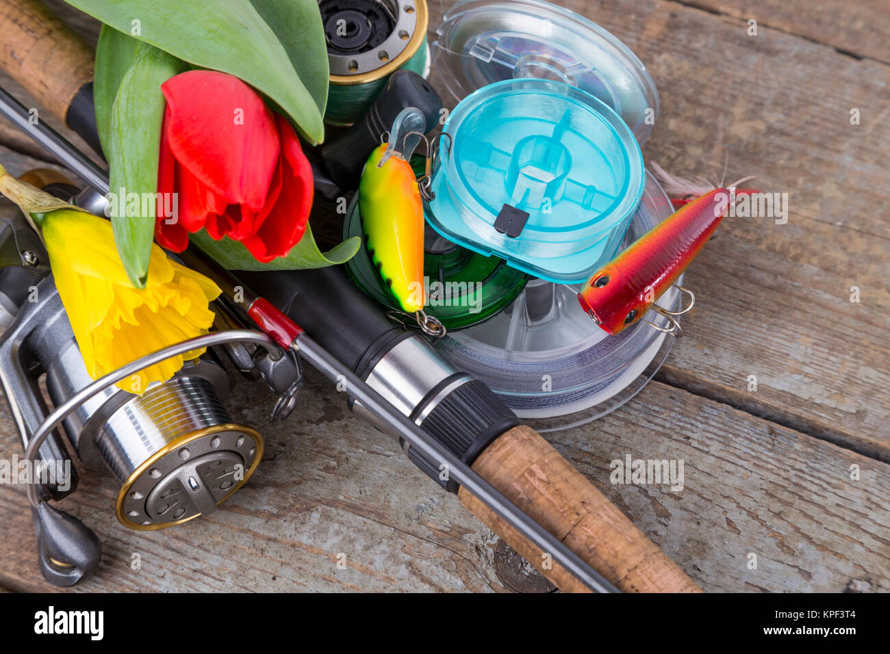 fishing tackles with spring flowers Stock Photo - Alamy
