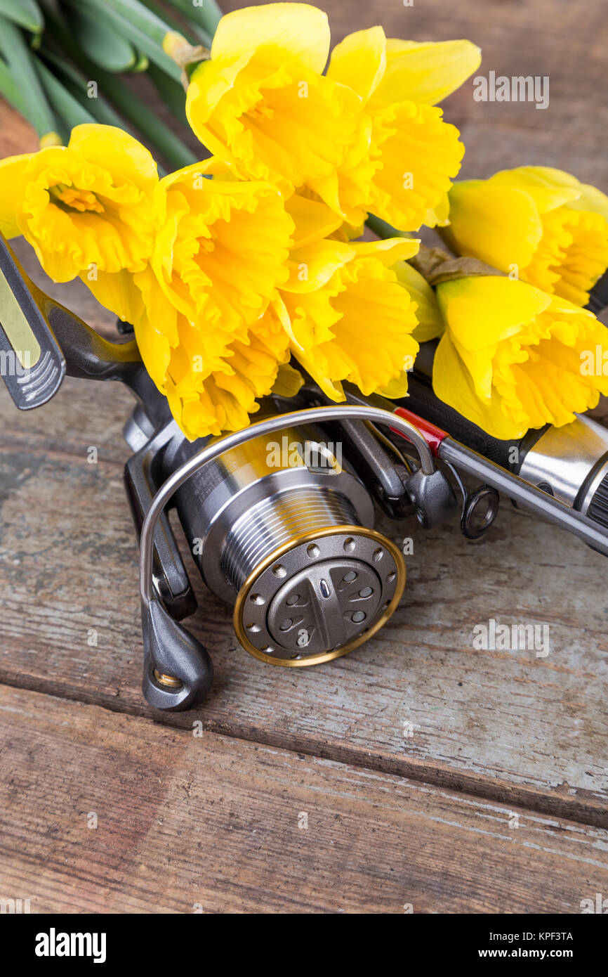 fishing tackles with bouquet spring flowers Stock Photo - Alamy