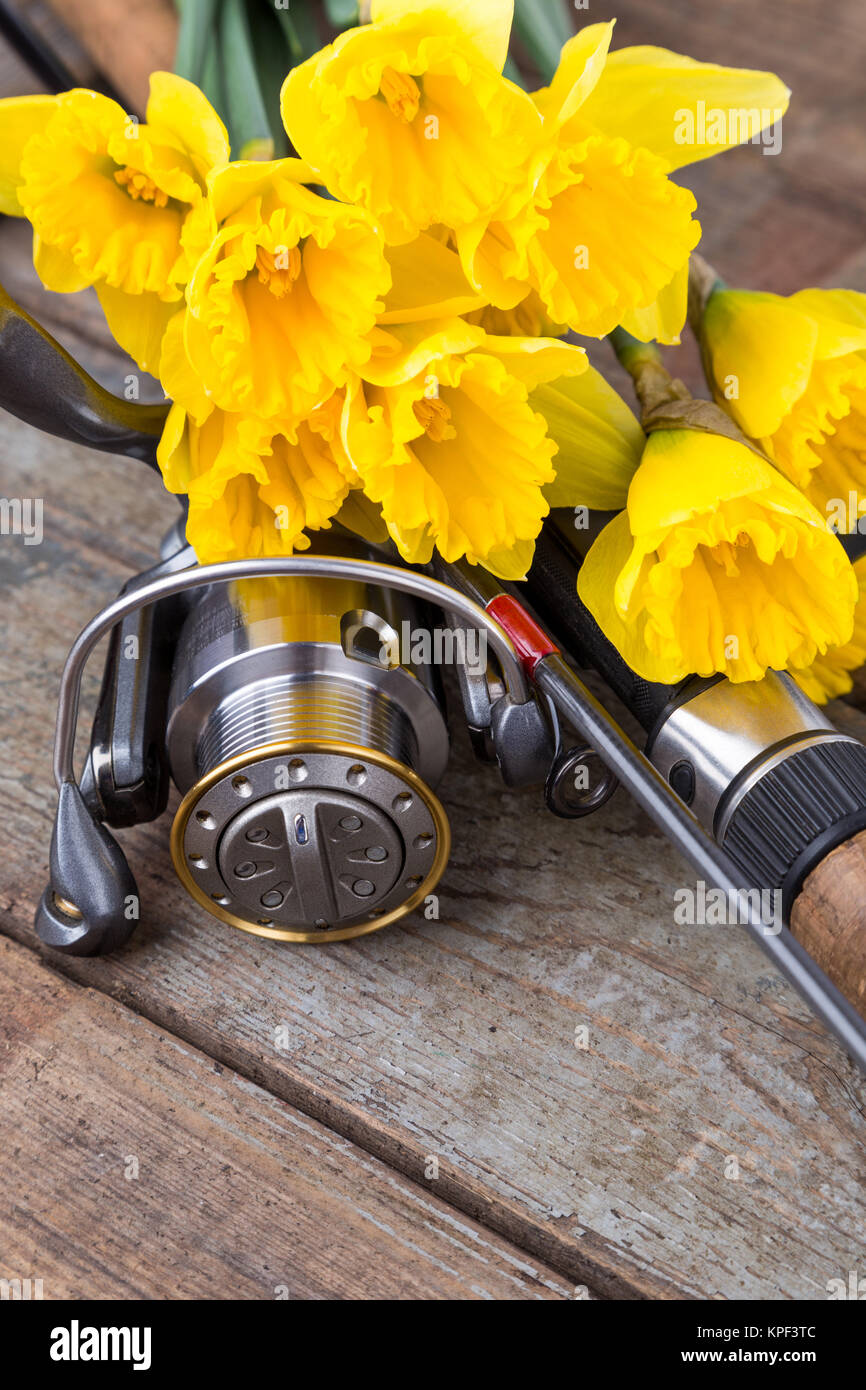 fishing tackles with bouquet spring flowers Stock Photo - Alamy