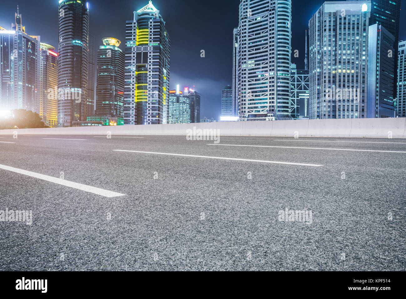 empty asphalt road through modern city in China Stock Photo - Alamy