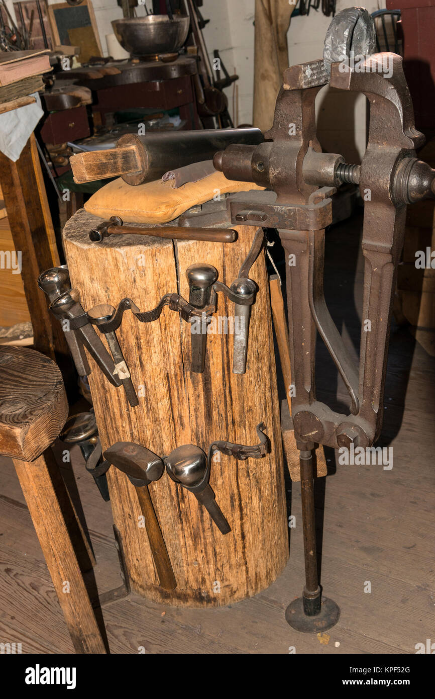 Tools in Colonial Williamsburg silversmith shop Stock Photo - Alamy