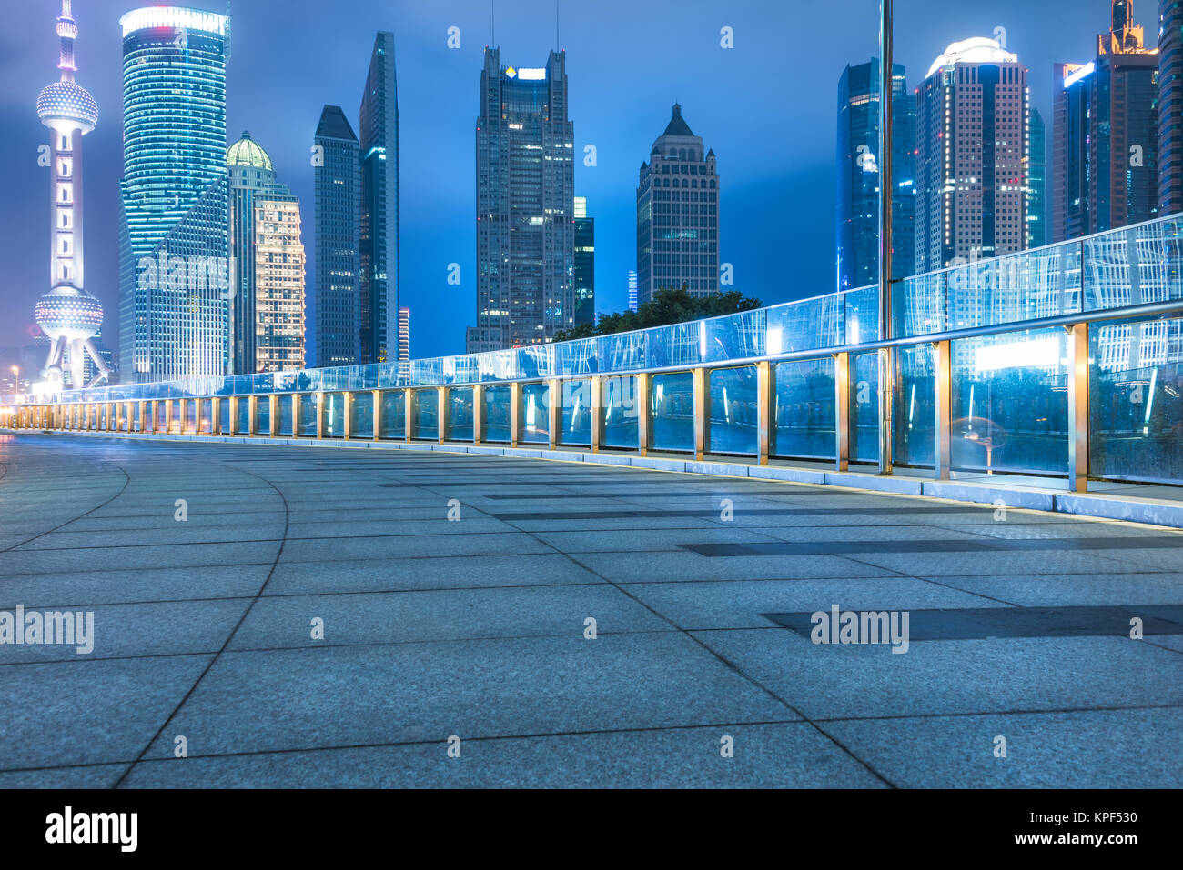 empty square with modern building in background at night Stock Photo ...