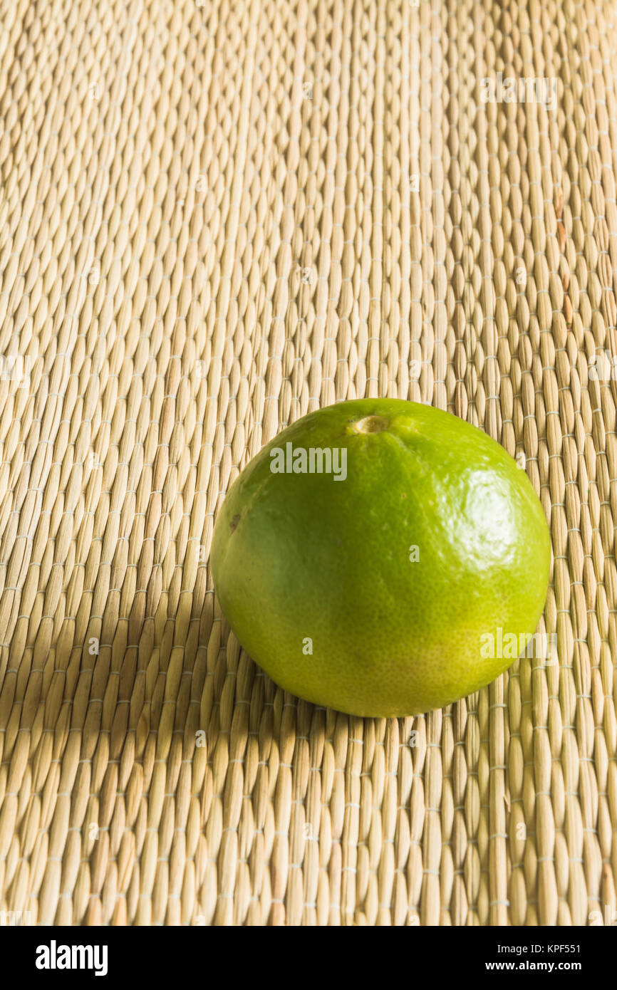 lime on mat background Stock Photo - Alamy